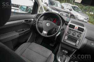Grey Volkswagen Touran 2007 in Riga, with an engine capacity of 2.00 L and mileage of 290 thousand km for 4590 €, photo 9 on AUTOMOTO.COM.LV