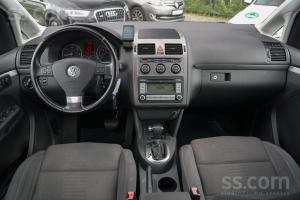 Grey Volkswagen Touran 2007 in Riga, with an engine capacity of 2.00 L and mileage of 290 thousand km for 4590 €, photo 10 on AUTOMOTO.COM.LV