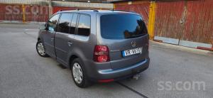 Pelēks Volkswagen Touran 2007 Rīga, ar dzinēja tilpumu 1.90 L un nobraukumu 311 tūkst. km par 2400 €, foto 9 vietnē AUTOMOTO.COM.LV