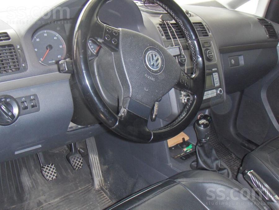 Grey Volkswagen Touran 2007 in Talsi, with an engine capacity of 2.00 L and mileage of 234 thousand km for 2490 €, photo 3 on AUTOMOTO.COM.LV