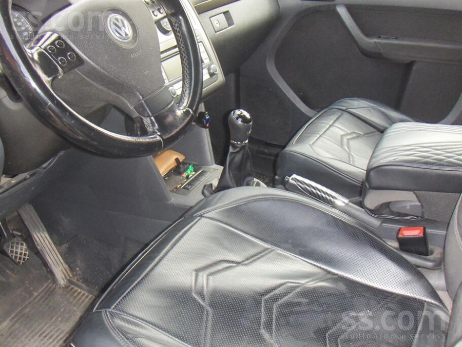 Grey Volkswagen Touran 2007 in Talsi, with an engine capacity of 2.00 L and mileage of 234 thousand km for 2490 €, photo 7 on AUTOMOTO.COM.LV