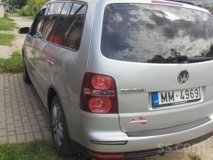Grey Volkswagen Touran 2007 in Talsi, with an engine capacity of 2.00 L and mileage of 234 thousand km for 2490 €, photo 8 on AUTOMOTO.COM.LV