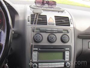 Grey Volkswagen Touran 2007 in Talsi, with an engine capacity of 2.00 L and mileage of 234 thousand km for 2490 €, photo 11 on AUTOMOTO.COM.LV