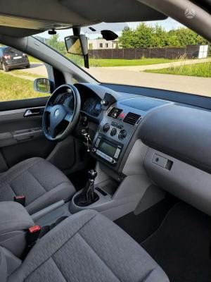 Grey Volkswagen Touran 2007 in Kaisiadorys, with an engine capacity of 1.97 L and mileage of 319 thousand km for 2649 €, photo 17 on AUTOMOTO.COM.LV