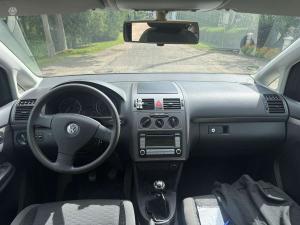 Grey Volkswagen Touran 2007 in Marijampole, with an engine capacity of 1.90 L and mileage of 355 thousand km for 2150 €, photo 13 on AUTOMOTO.COM.LV