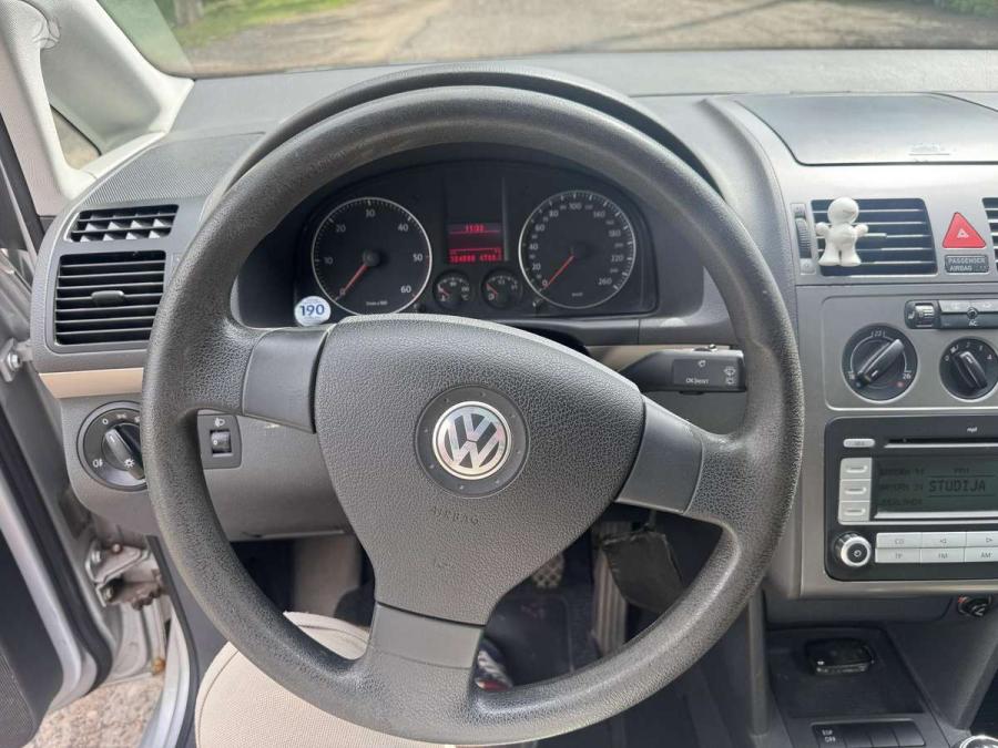 Grey Volkswagen Touran 2007 in Marijampole, with an engine capacity of 1.90 L and mileage of 355 thousand km for 2150 €, photo 18 on AUTOMOTO.COM.LV