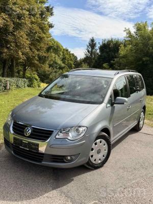 Grey Volkswagen Touran 2007 in Ludza, with an engine capacity of 2.00 L and mileage of 196 thousand km for 4390 €, photo  on AUTOMOTO.COM.LV