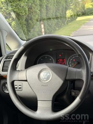 Grey Volkswagen Touran 2007 in Ludza, with an engine capacity of 2.00 L and mileage of 196 thousand km for 4390 €, photo 10 on AUTOMOTO.COM.LV