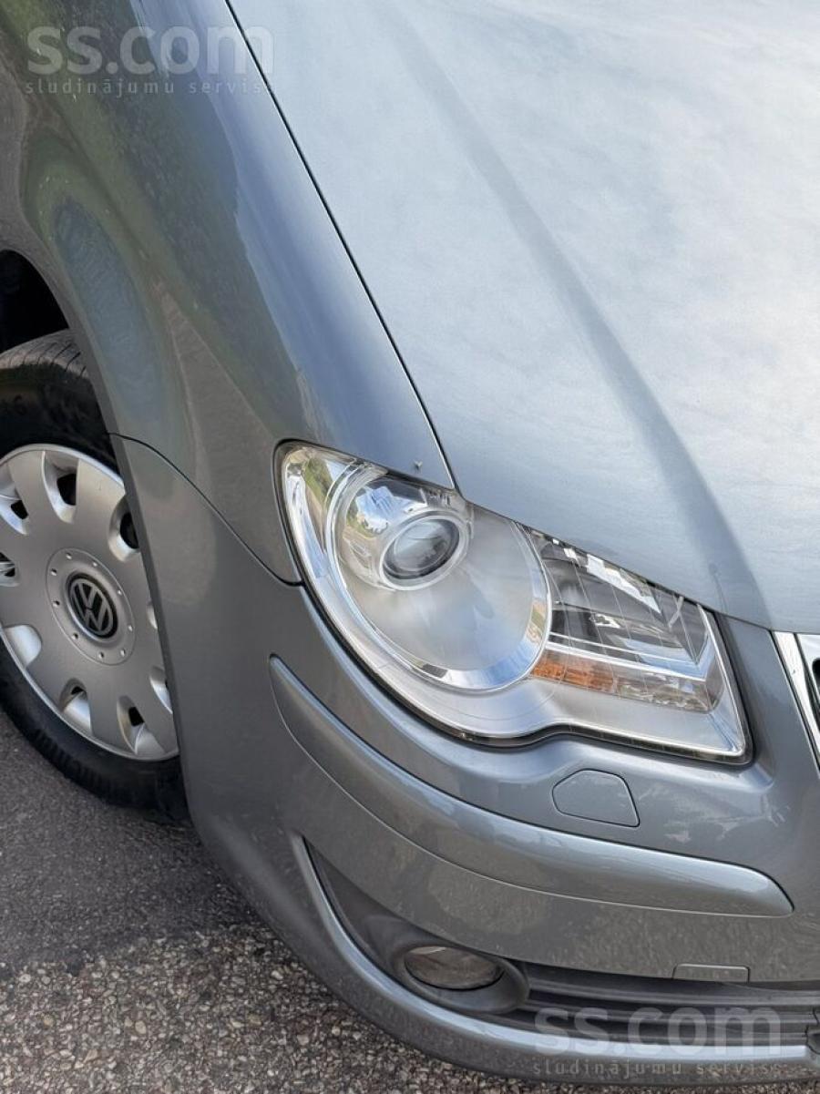 Grey Volkswagen Touran 2007 in Ludza, with an engine capacity of 2.00 L and mileage of 196 thousand km for 4390 €, photo 14 on AUTOMOTO.COM.LV