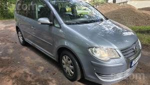 Grey Volkswagen Touran 2007 in Riga, with an engine capacity of 1.40 L and mileage of 221 thousand km for 3500 €, photo  on AUTOMOTO.COM.LV