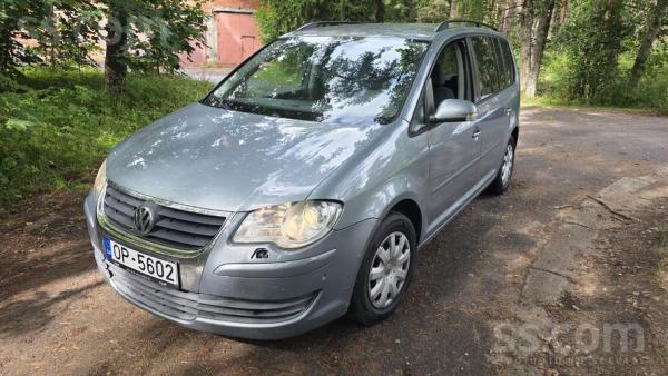Grey Volkswagen Touran 2007 in Riga, with an engine capacity of 1.40 L and mileage of 221 thousand km for 3500 €, photo 2 on AUTOMOTO.COM.LV