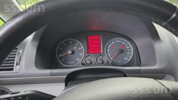 Grey Volkswagen Touran 2007 in Riga, with an engine capacity of 1.40 L and mileage of 221 thousand km for 3500 €, photo 6 on AUTOMOTO.COM.LV