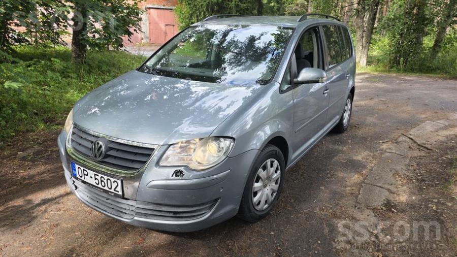 Pelēks Volkswagen Touran 2007 Rīga, ar dzinēja tilpumu 1.40 L un nobraukumu 221 tūkst. km par 2950 €, foto 3 vietnē AUTOMOTO.COM.LV