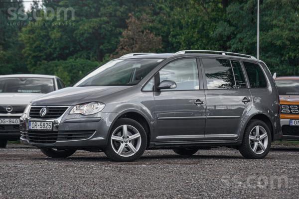 Grey Volkswagen Touran 2007 in Riga, with an engine capacity of 1.40 L and mileage of 137 thousand km for 4990 €, photo 1 on AUTOMOTO.COM.LV