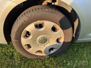 Pelēks Volkswagen Touran 2007 Alūksne, ar dzinēja tilpumu 1.90 L un nobraukumu 301 tūkst. km par 3400 €, foto 10 vietnē AUTOMOTO.COM.LV