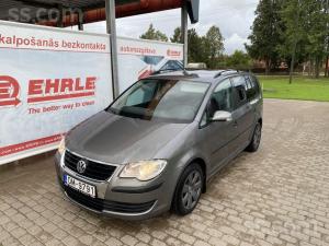 Grey Volkswagen Touran 2007 in Balvi, with an engine capacity of 1.90 L and mileage of 340 thousand km for 2450 €, photo 1 on AUTOMOTO.COM.LV