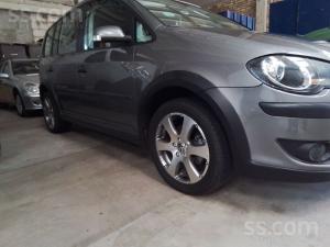 Grey Volkswagen Touran 2007 in Riga, with an engine capacity of 1.90 L and mileage of 220 thousand km for 4750 €, photo 6 on AUTOMOTO.COM.LV