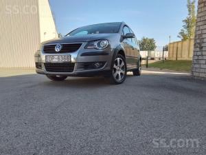 Grey Volkswagen Touran 2007 in Riga, with an engine capacity of 1.90 L and mileage of 220 thousand km for 4750 €, photo  on AUTOMOTO.COM.LV