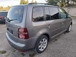 Grey Volkswagen Touran 2007 in Utena, with an engine capacity of 1.97 L and mileage of 215 thousand km for 2900 €, photo 9 on AUTOMOTO.COM.LV