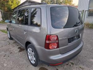 Grey Volkswagen Touran 2007 in Utena, with an engine capacity of 1.97 L and mileage of 215 thousand km for 2900 €, photo 13 on AUTOMOTO.COM.LV