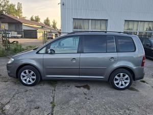 Grey Volkswagen Touran 2007 in Utena, with an engine capacity of 1.97 L and mileage of 215 thousand km for 2900 €, photo 14 on AUTOMOTO.COM.LV