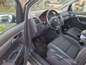 Grey Volkswagen Touran 2007 in Utena, with an engine capacity of 1.97 L and mileage of 215 thousand km for 2900 €, photo 15 on AUTOMOTO.COM.LV