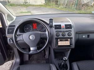 Grey Volkswagen Touran 2007 in Utena, with an engine capacity of 1.97 L and mileage of 215 thousand km for 2900 €, photo 18 on AUTOMOTO.COM.LV
