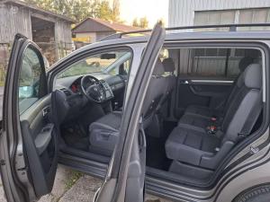 Grey Volkswagen Touran 2007 in Utena, with an engine capacity of 1.97 L and mileage of 215 thousand km for 2900 €, photo 19 on AUTOMOTO.COM.LV