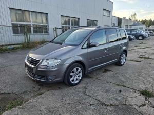 Grey Volkswagen Touran 2007 in Utena, with an engine capacity of 1.97 L and mileage of 215 thousand km for 2900 €, photo 23 on AUTOMOTO.COM.LV