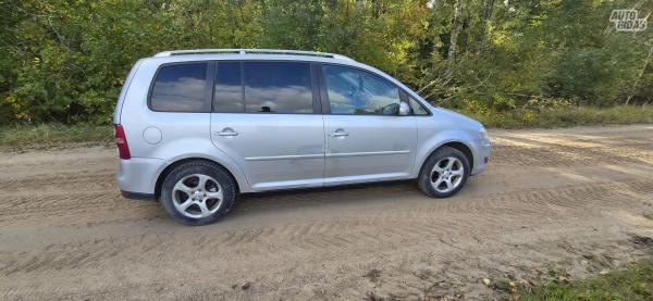Grey Volkswagen Touran 2007 in Lazdijai, with an engine capacity of 2.00 L and mileage of 277 thousand km for 1350 €, photo 6 on AUTOMOTO.COM.LV