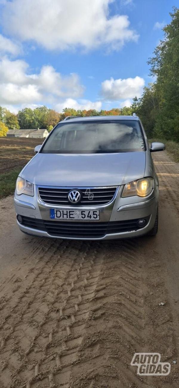 Grey Volkswagen Touran 2007 in Lazdijai, with an engine capacity of 2.00 L and mileage of 277 thousand km for 1350 €, photo 10 on AUTOMOTO.COM.LV