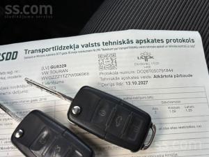 Grey Volkswagen Touran 2007 in Dobele, with an engine capacity of 1.90 L and mileage of 201 thousand km for 2350 €, photo 10 on AUTOMOTO.COM.LV