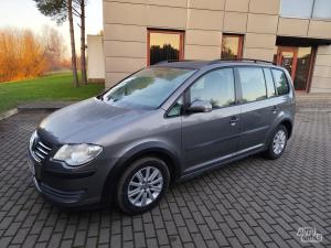 Pelēks Volkswagen Touran 2008 Mažeikiai, ar dzinēja tilpumu 1.90 L un nobraukumu 289 tūkst. km par 3950 €, foto  vietnē AUTOMOTO.COM.LV