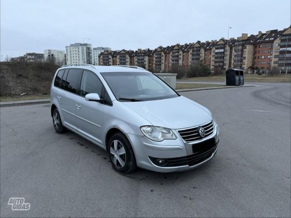 Grey Volkswagen Touran 2008 in Vilnius, with an engine capacity of 1.90 L and mileage of 358 thousand km for 2900 €, photo 1 on AUTOMOTO.COM.LV