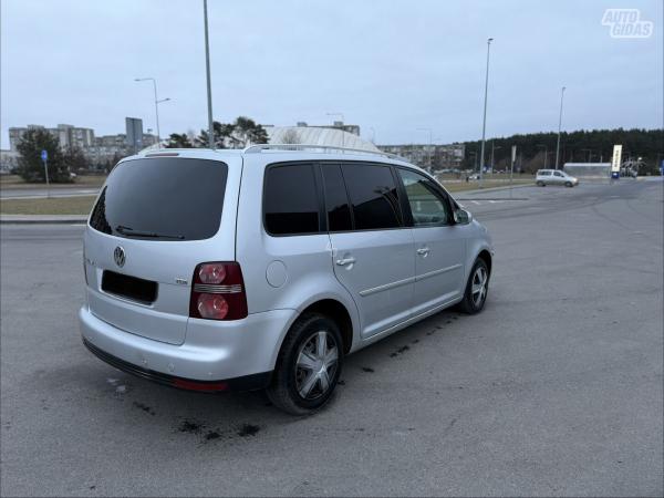 Grey Volkswagen Touran 2008 in Vilnius, with an engine capacity of 1.90 L and mileage of 358 thousand km for 2900 €, photo 5 on AUTOMOTO.COM.LV