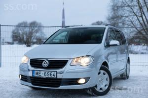 Grey Volkswagen Touran 2008 in Riga, with an engine capacity of 1.90 L and mileage of 255 thousand km for 3990 €, photo  on AUTOMOTO.COM.LV