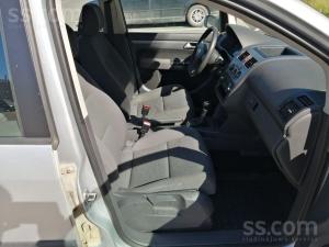 Grey Volkswagen Touran 2008 in Riga, with an engine capacity of 1.90 L and mileage of 380 thousand km for 1350 €, photo 8 on AUTOMOTO.COM.LV