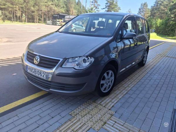 Grey Volkswagen Touran 2008 in Utena, with an engine capacity of 1.90 L and mileage of 256 thousand km for 2950 €, photo 2 on AUTOMOTO.COM.LV
