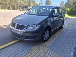 Grey Volkswagen Touran 2008 in Utena, with an engine capacity of 1.90 L and mileage of 256 thousand km for 2950 €, photo 3 on AUTOMOTO.COM.LV