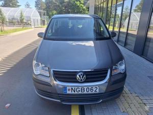Grey Volkswagen Touran 2008 in Utena, with an engine capacity of 1.90 L and mileage of 256 thousand km for 2950 €, photo 6 on AUTOMOTO.COM.LV