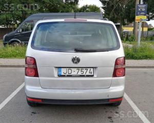Grey Volkswagen Touran 2008 in Riga, with an engine capacity of 1.90 L and mileage of 380 thousand km for 1300 €, photo 5 on AUTOMOTO.COM.LV