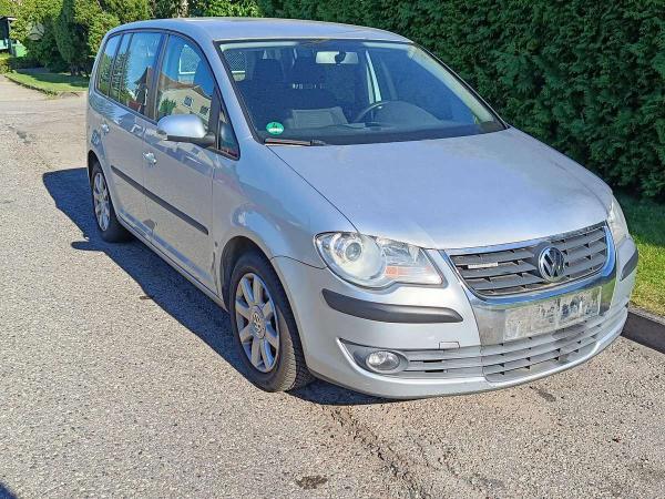 Grey Volkswagen Touran 2008 in Marijampole, with an engine capacity of 0.00 L and mileage of 270 thousand km for 3200 €, photo 1 on AUTOMOTO.COM.LV