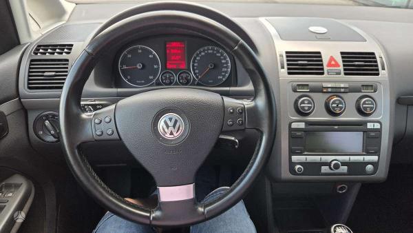 Grey Volkswagen Touran 2008 in Utena, with an engine capacity of 1.90 L and mileage of 269 thousand km for 2950 €, photo 7 on AUTOMOTO.COM.LV