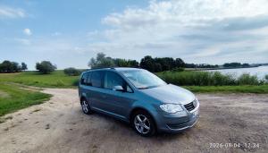 Grey Volkswagen Touran 2008 in Kaunas, with an engine capacity of 1.90 L and mileage of 311 thousand km for 1700 €, photo 3 on AUTOMOTO.COM.LV