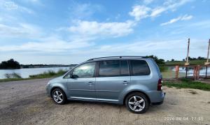 Grey Volkswagen Touran 2008 in Kaunas, with an engine capacity of 1.90 L and mileage of 311 thousand km for 1700 €, photo 6 on AUTOMOTO.COM.LV