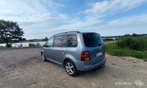Grey Volkswagen Touran 2008 in Kaunas, with an engine capacity of 1.90 L and mileage of 311 thousand km for 1700 €, photo 7 on AUTOMOTO.COM.LV