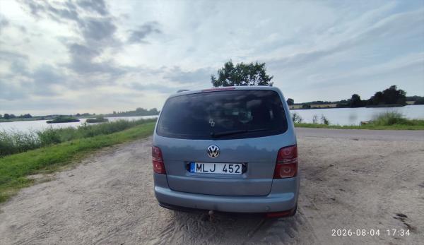 Grey Volkswagen Touran 2008 in Kaunas, with an engine capacity of 1.90 L and mileage of 311 thousand km for 1700 €, photo 8 on AUTOMOTO.COM.LV