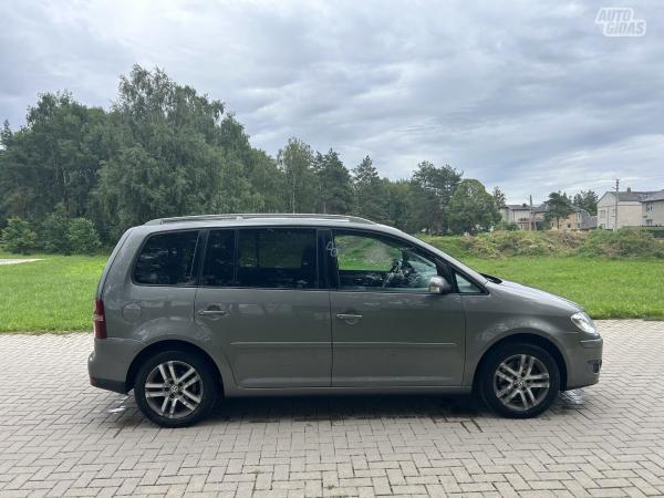 Grey Volkswagen Touran 2008 in Radviliskis, with an engine capacity of 1.90 L and mileage of 280 thousand km for 3450 €, photo 6 on AUTOMOTO.COM.LV