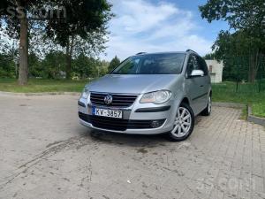 Grey Volkswagen Touran 2008 in Riga, with an engine capacity of 1.90 L and mileage of 306 thousand km for 1890 €, photo  on AUTOMOTO.COM.LV