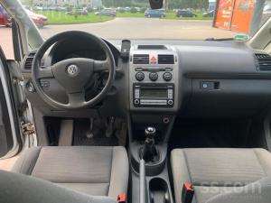 Pelēks Volkswagen Touran 2008 Rīga, ar dzinēja tilpumu 1.90 L un nobraukumu 306 tūkst. km par 1890 €, foto 8 vietnē AUTOMOTO.COM.LV